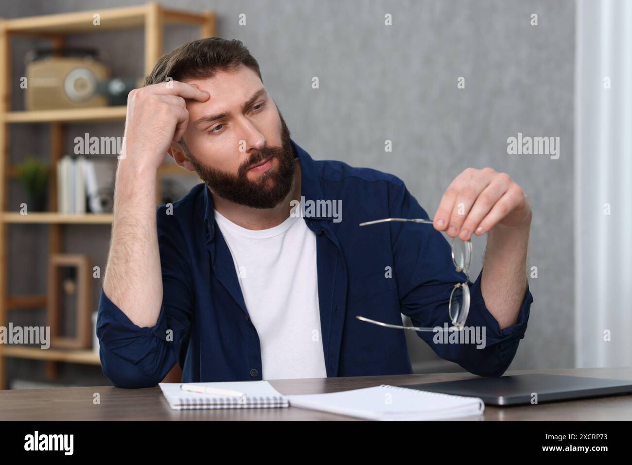 Worried overwhelmed man home hi-res stock photography and images - Alamy