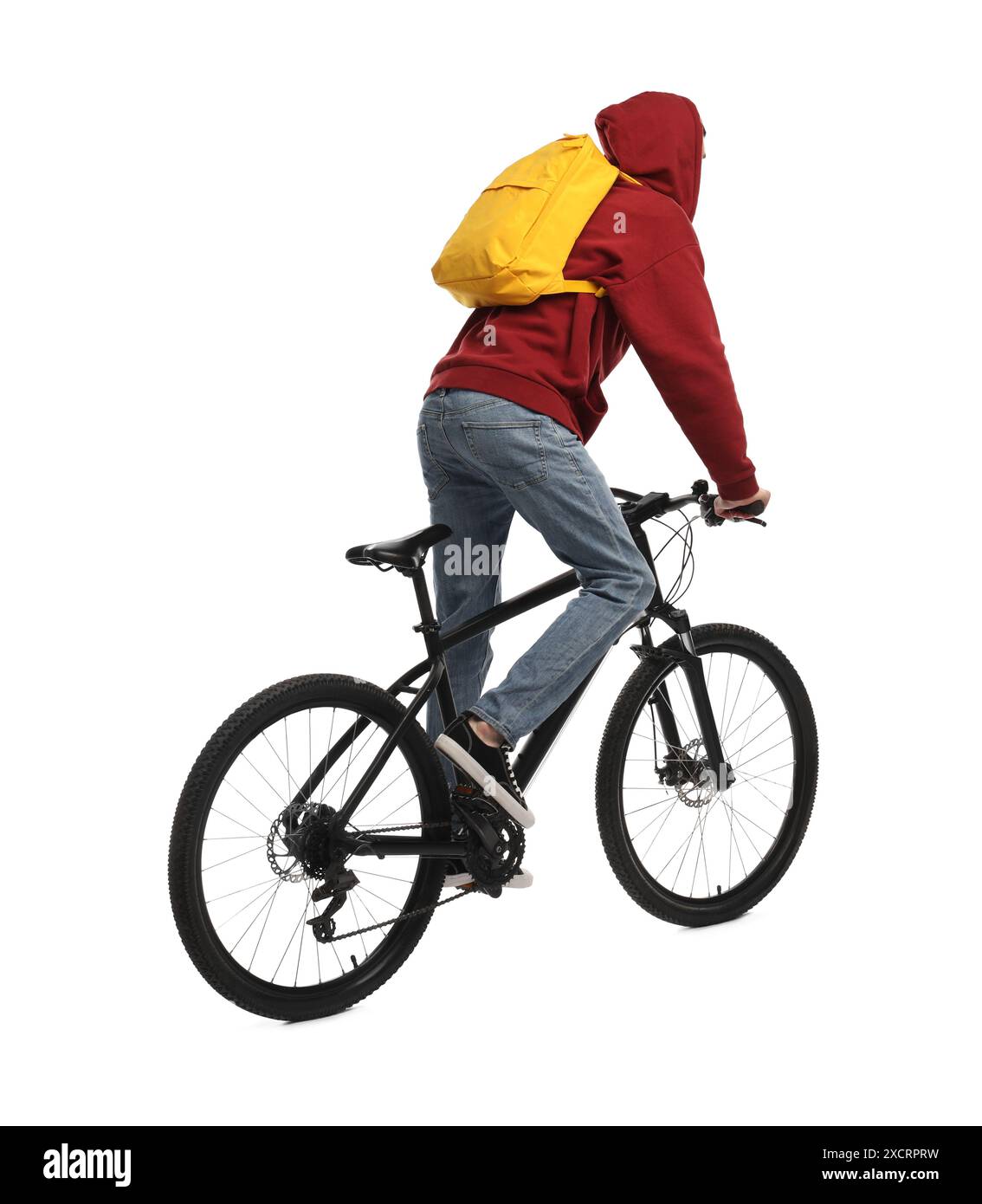 Man with backpack riding bicycle on white background Stock Photo - Alamy