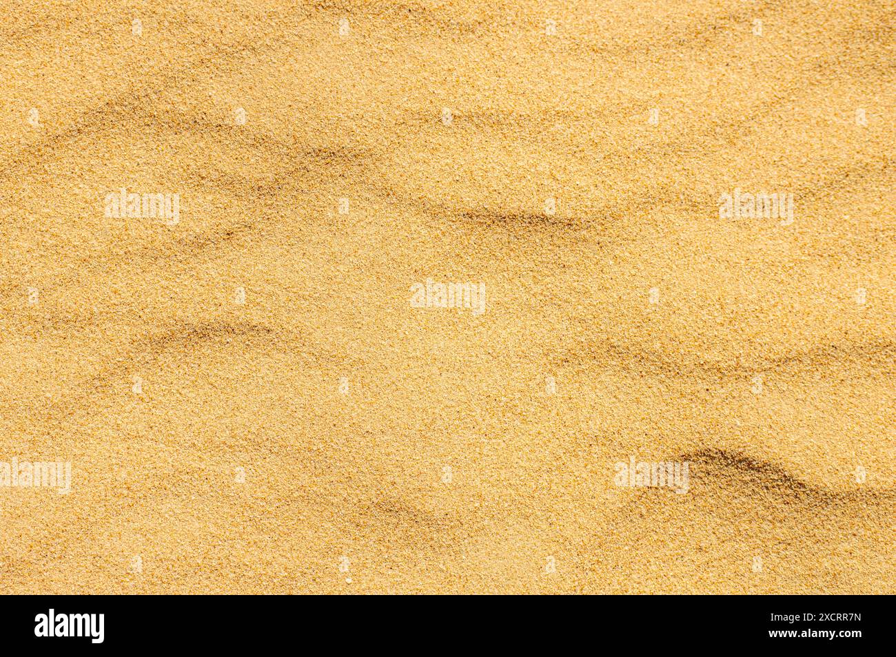 Gold sand on the beach, background series Stock Photo - Alamy
