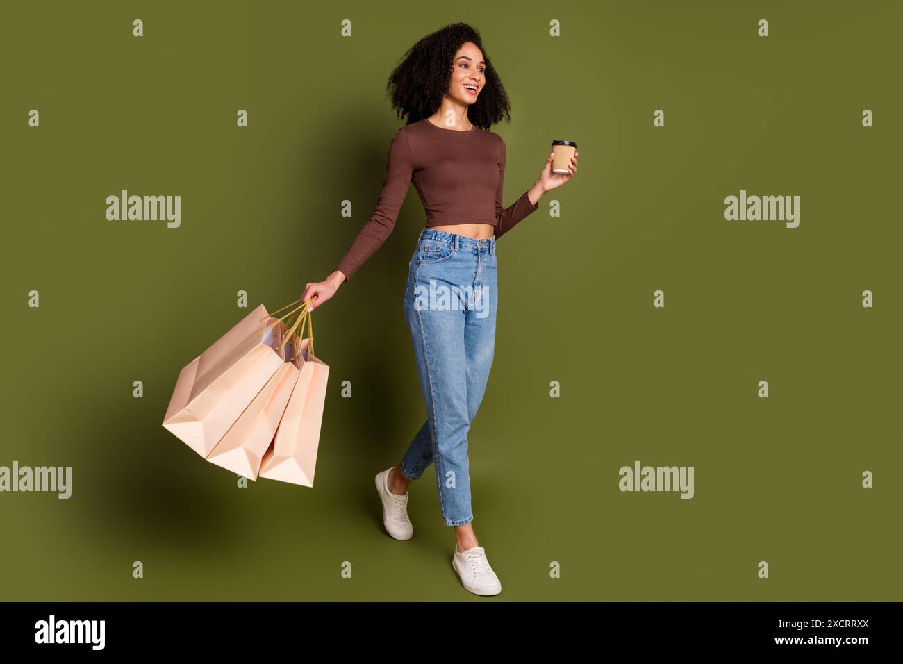 Full body photo of attractive young woman walk shopping bags coffee ...
