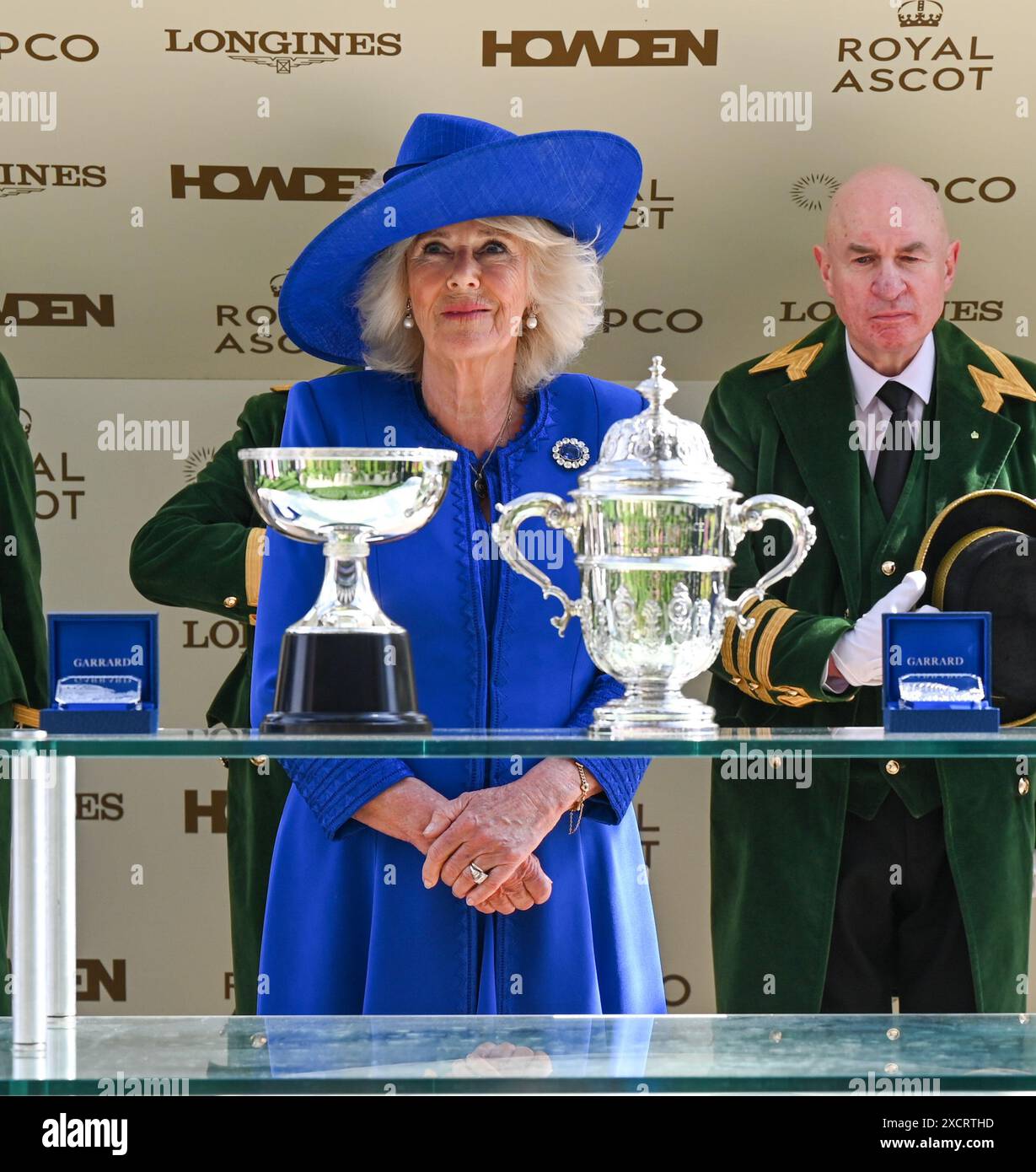 Ascot, UK. 18 June, 2024. HRH The Queen present the Trophy to the ...