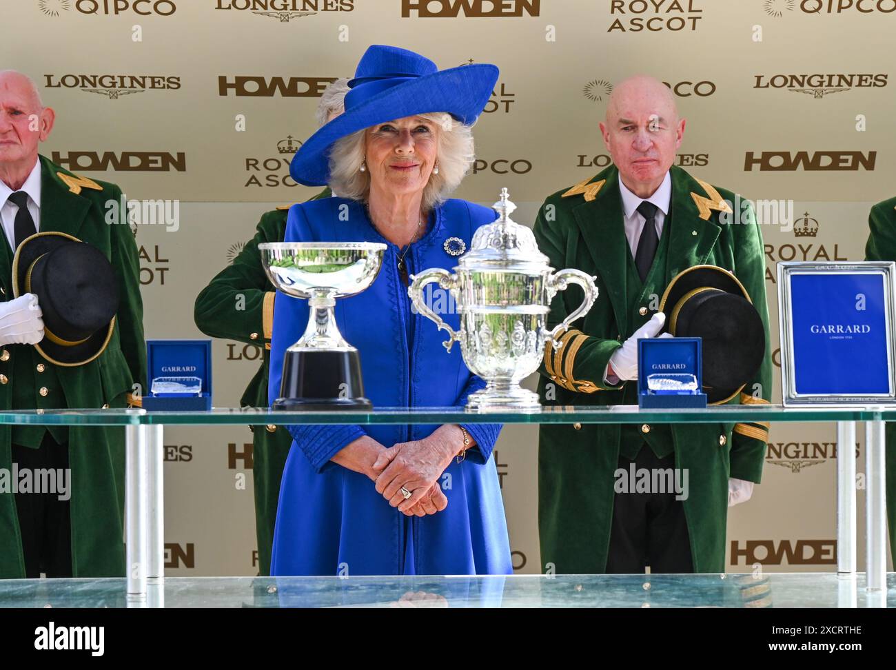 Ascot, UK. 18 June, 2024. HRH The Queen present the Trophy to the ...