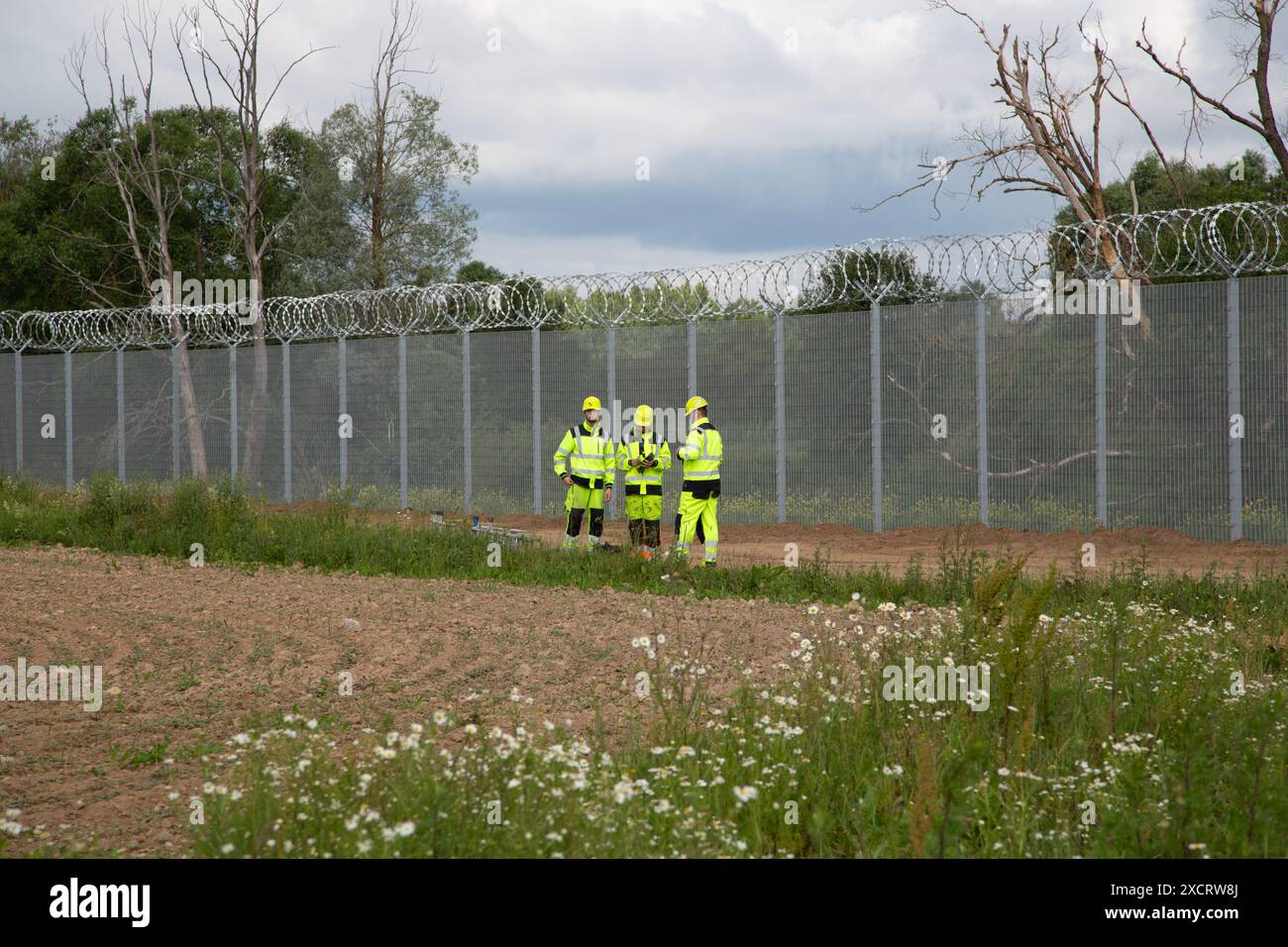 Karsava, Latvia. 18th June, 2024. Construction workers are busy ...