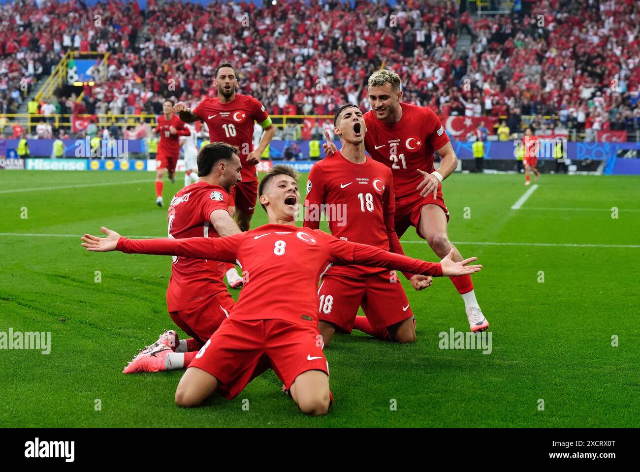 Turkey’s Mert Muldur (centre right) celebrates with teammates Baris ...