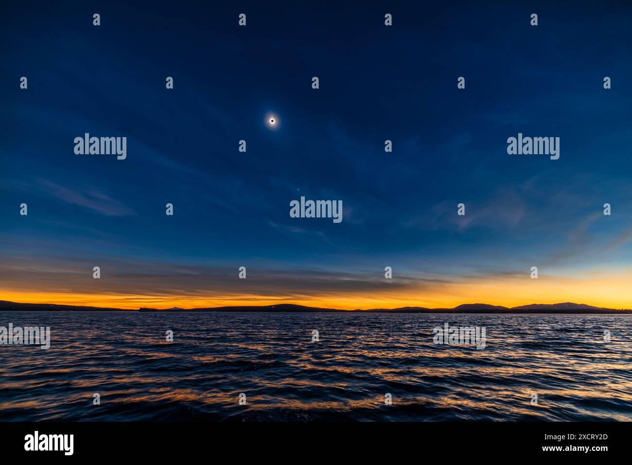 This is the total eclipse of the Sun over the waters of Lac Brome, in ...