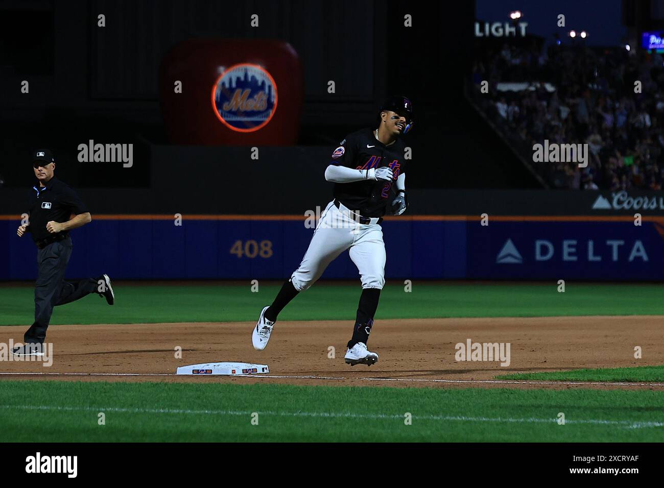 New York Mets Mark Vientos #27 rounds bases after homering during the ...