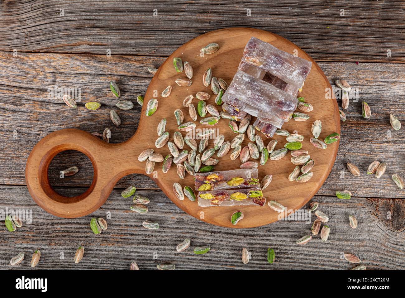 Assortment of Turkish delight with pistachio on a wooden background ...