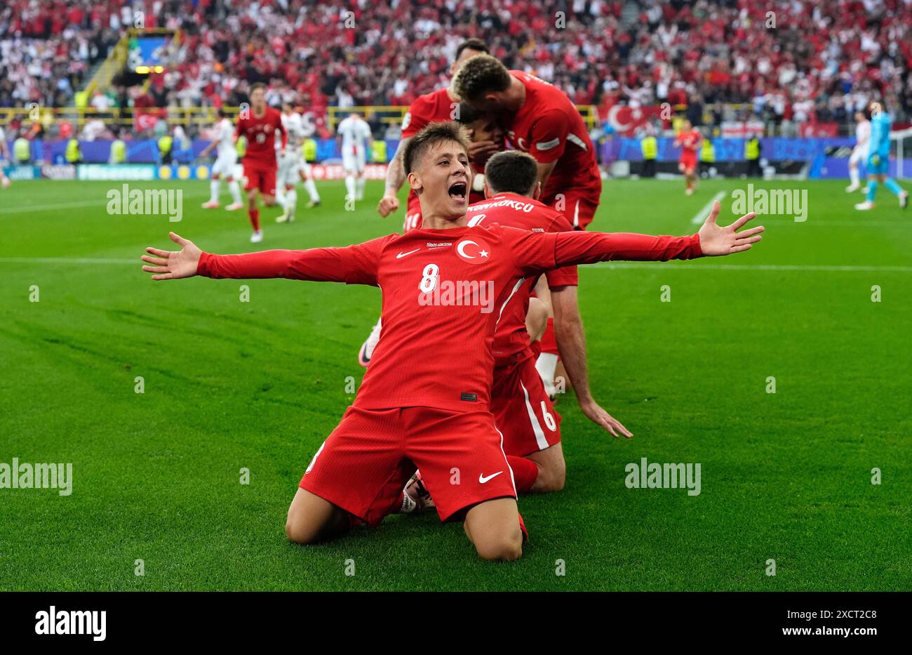 Turkey’s Arda Guler celebrates teammate Turkey’s Mert Muldur (not ...