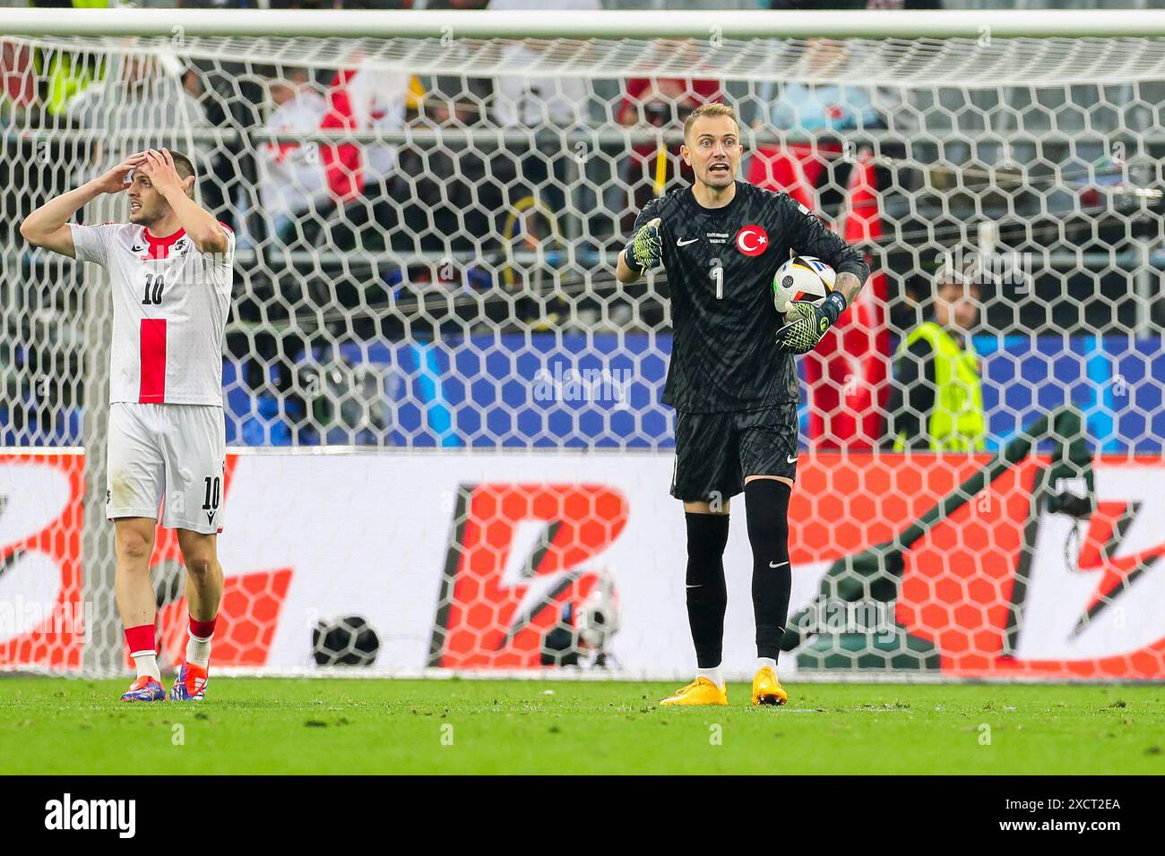 Dortmund, Germany. 18th June, 2024. Turkey goalkeeper Mert Gunok reacts ...