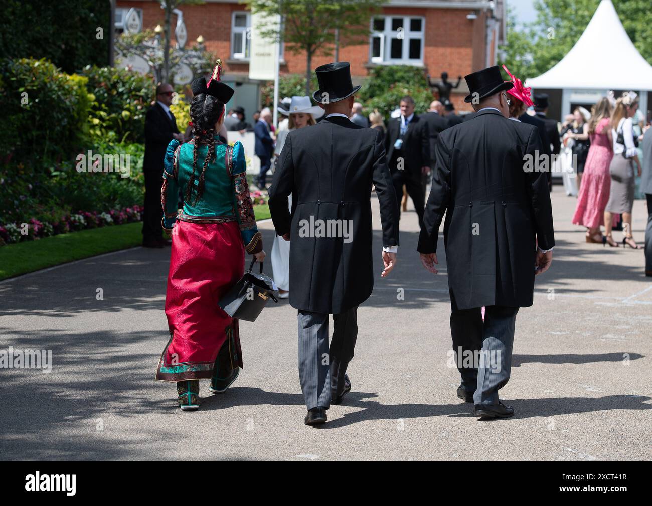 A lady wears a traditional outfit to day one of Royal Ascot Stock Photo ...