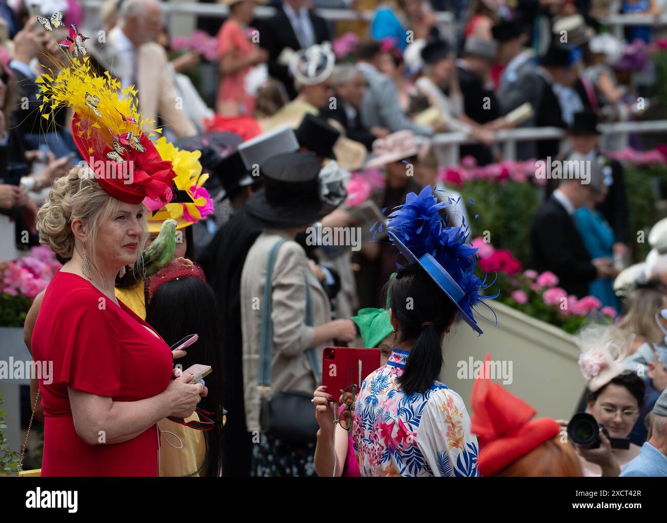 Racegoers in the Parade Ring waiting fo for the Royal Procession on day ...