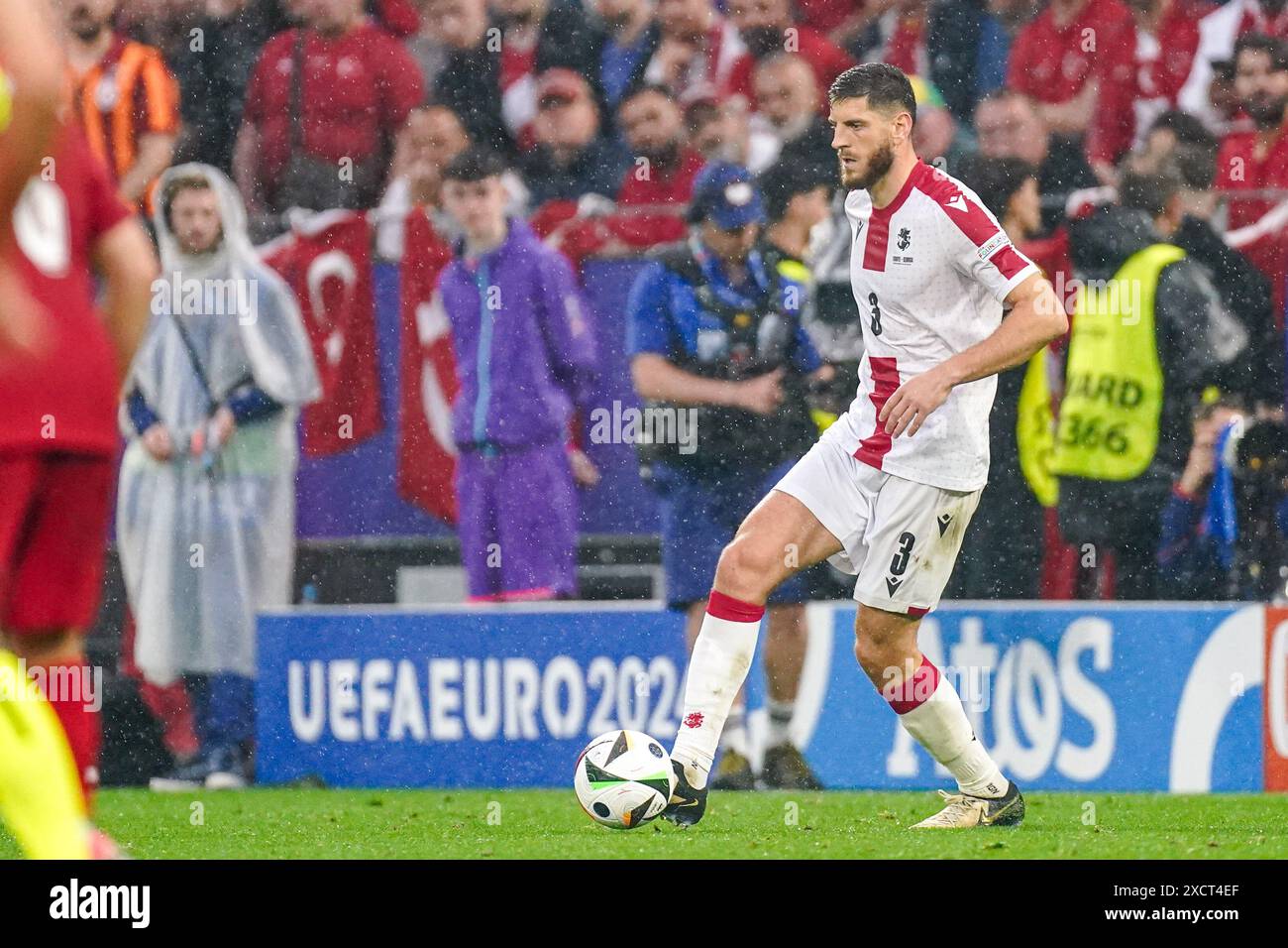 DORTMUND, GERMANY - JUNE 18: Lasha Dvali of Georgia runs with the ball ...