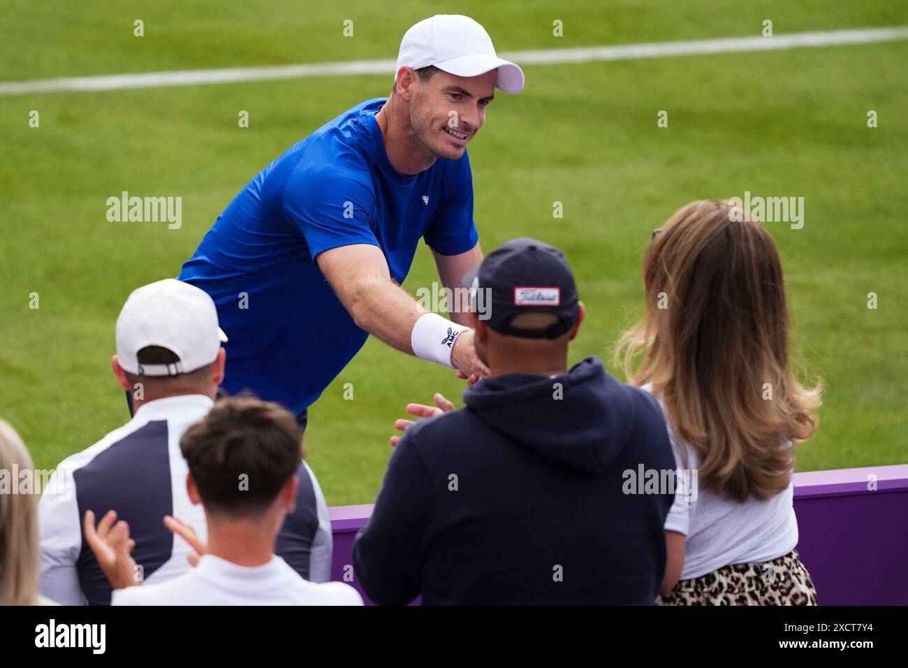 Andy Murray speaks to his wife Kim Sears after winning his match ...