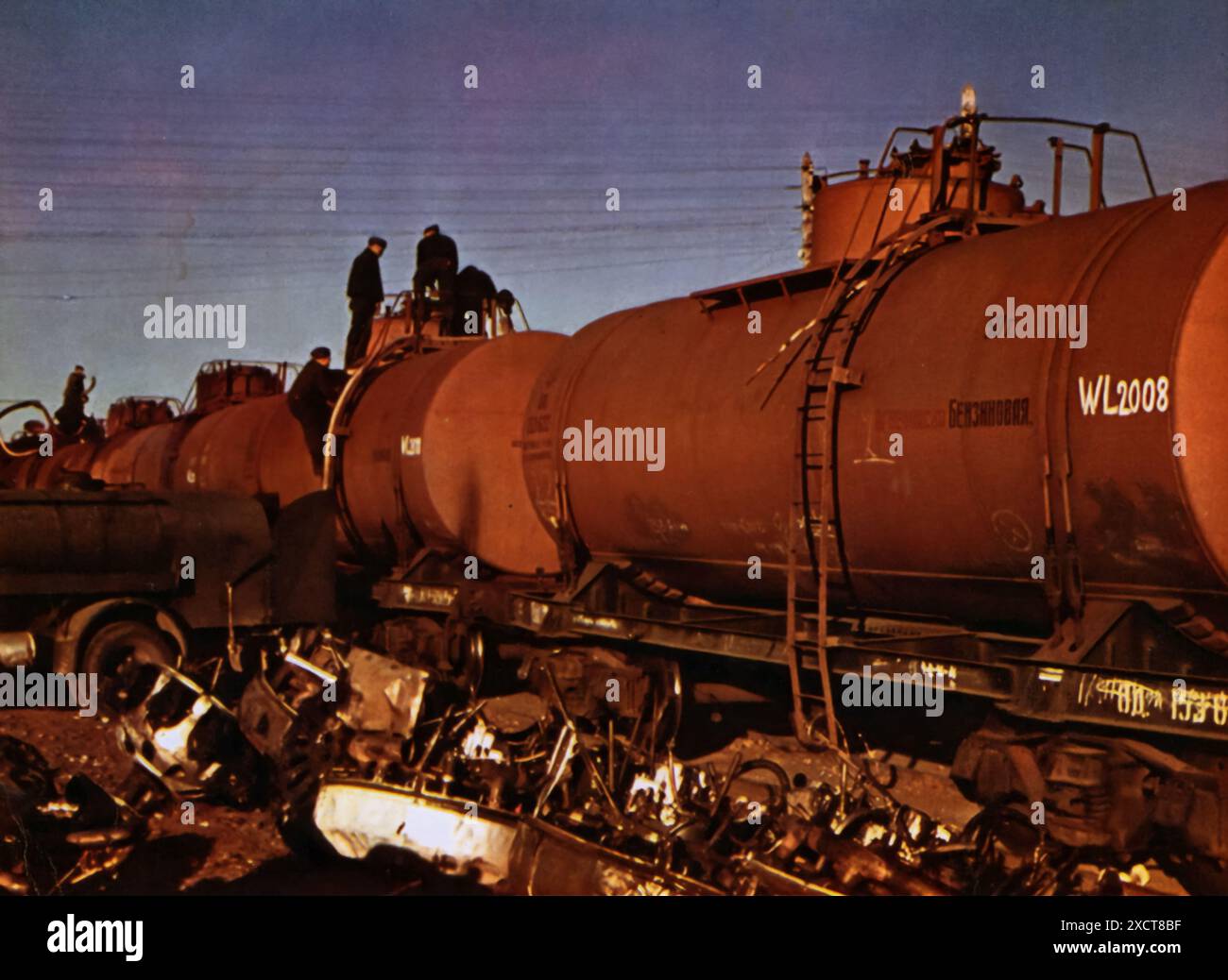 A photograph shows Luftwaffe personnel refueling their aircraft using ...
