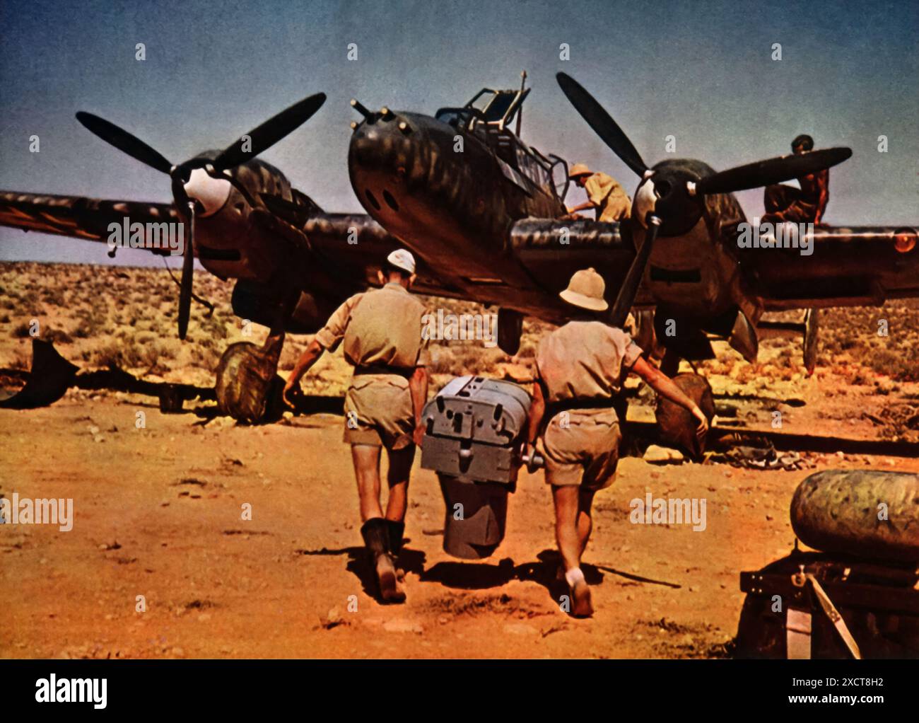 A photograph shows a Luftwaffe crew deploying an aerial reconnaissance ...