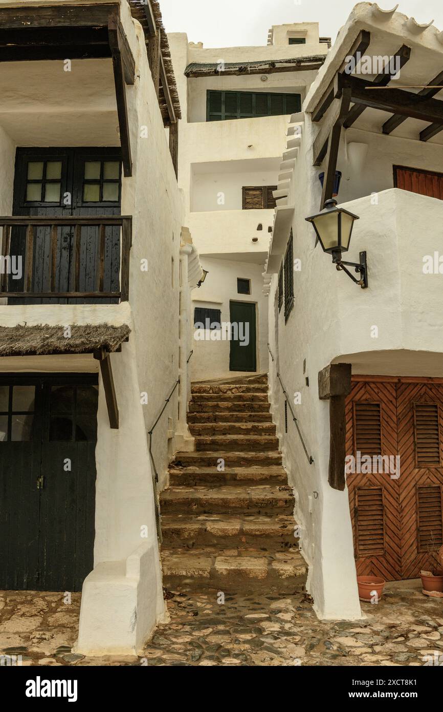Picturesque view of the traditional whitewashed houses and narrow ...