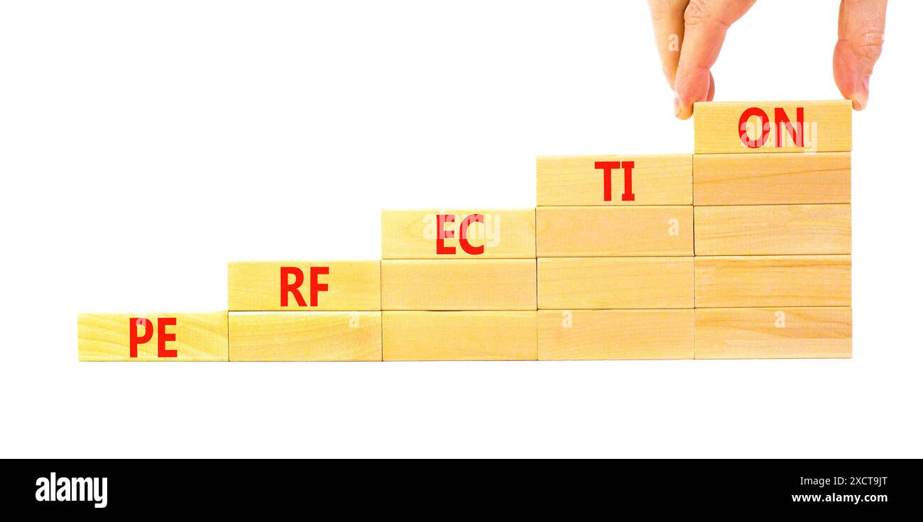 Perfection symbol. Concept word Perfection on beautiful wooden blocks ...