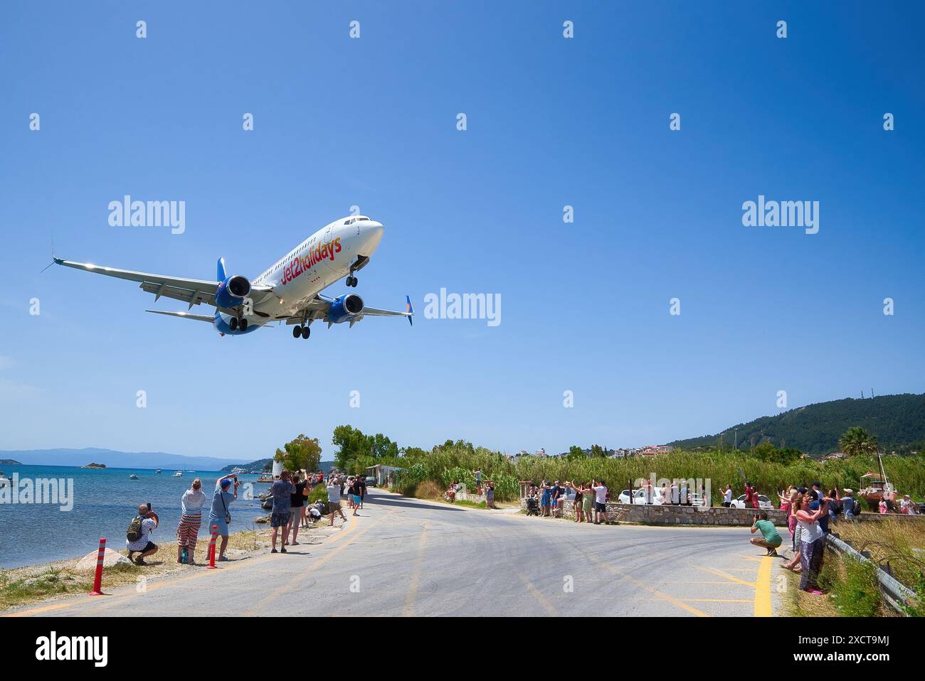 Skiathos Airport, Greece 2024. Aircraft. Tourists photograph the ...