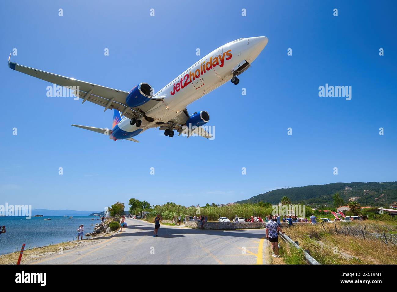 Skiathos Airport, Greece 2024. Aircraft. Tourists photograph the ...