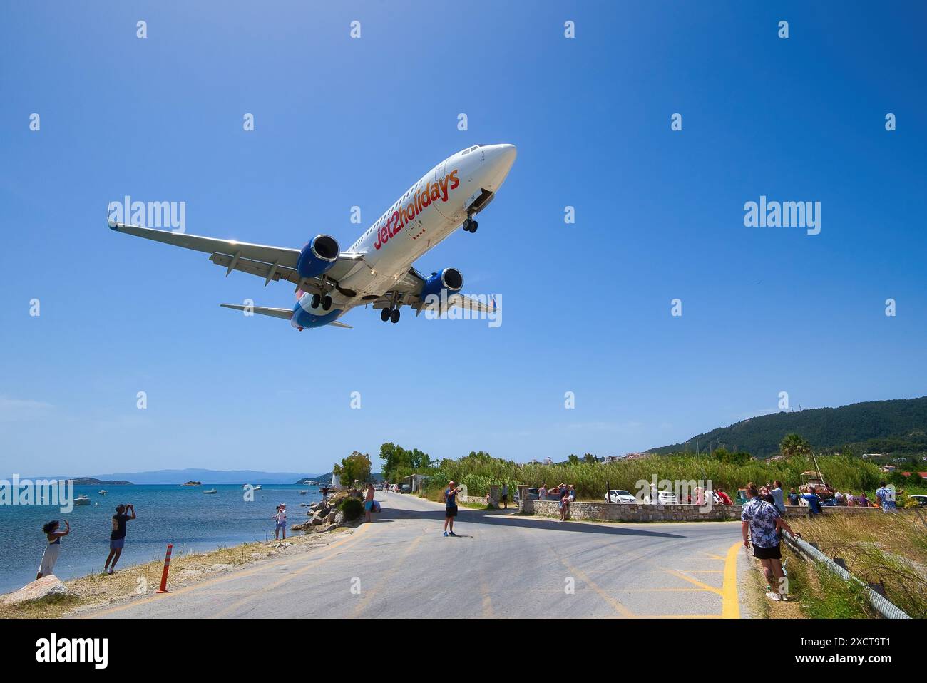 Skiathos Airport, Greece 2024. Aircraft. Tourists photograph the ...