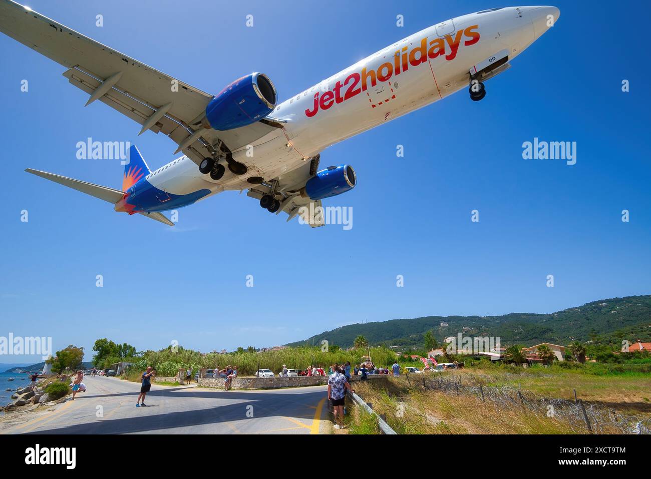 Skiathos Airport, Greece 2024. Aircraft. Tourists photograph the ...