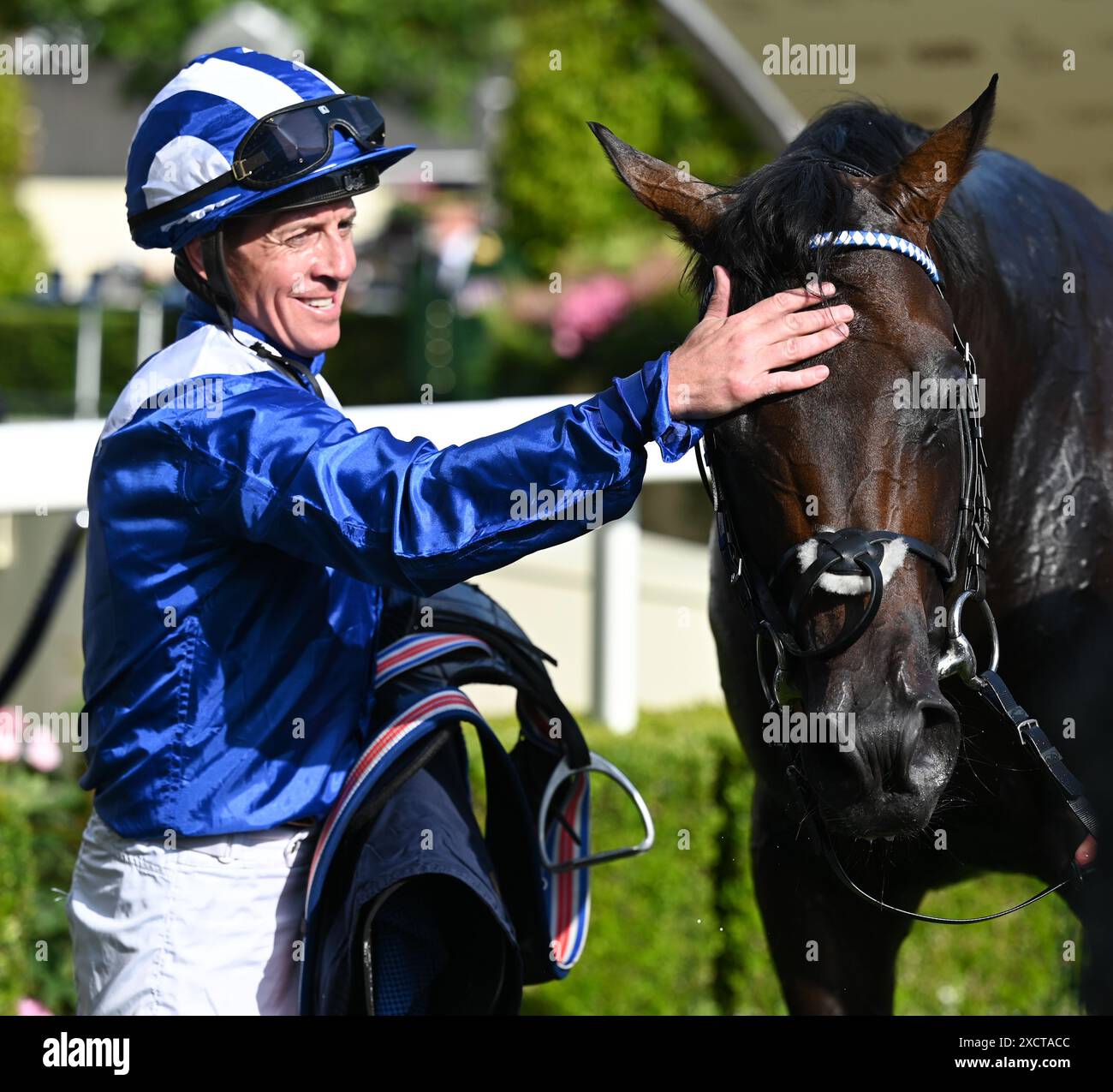 Ascot, UK. 18 June, 2024. Jim Crowley with Israr after their win in the ...