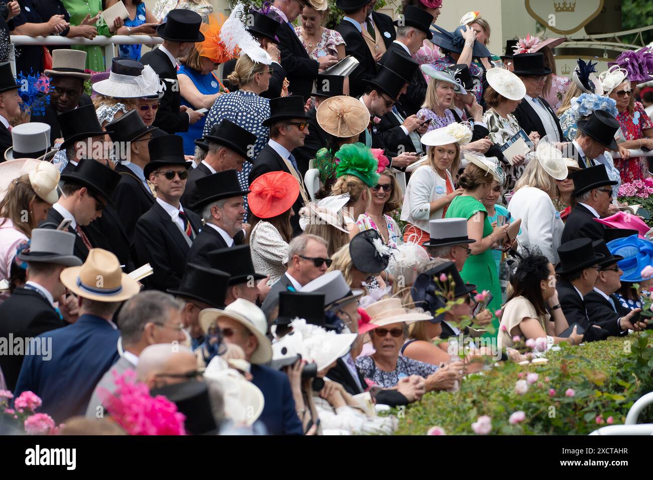 Racegoers in the Parade Ring waiting fo for the Royal Procession on day ...