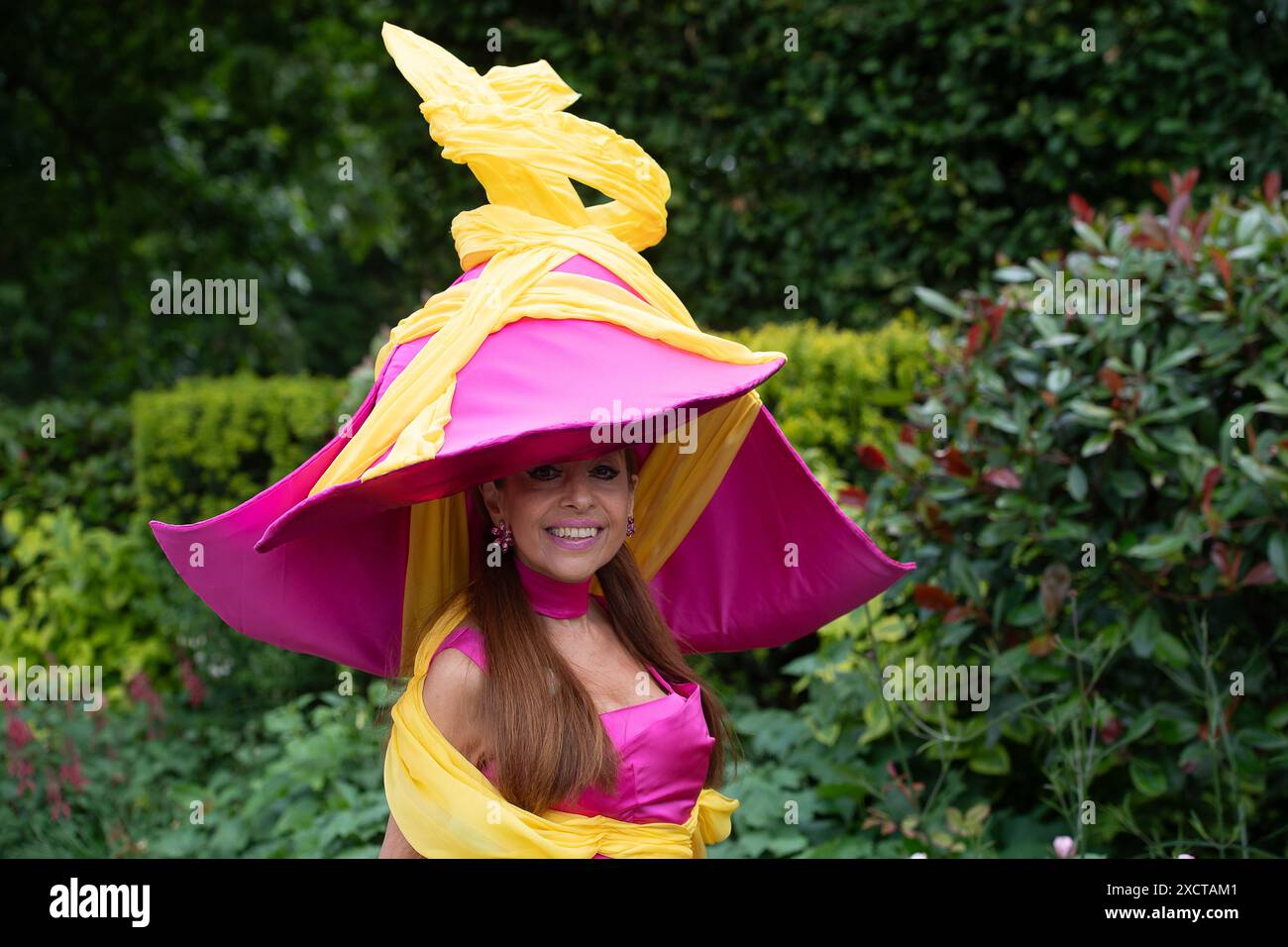 Hat Designer Tracy Rose wears a pink and yellow creation to Day One of ...
