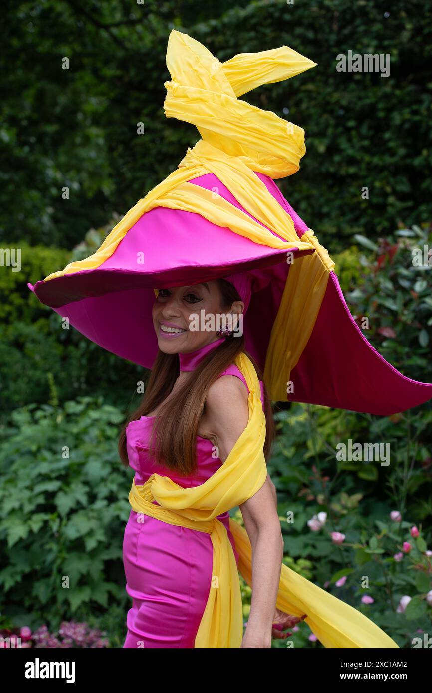 Hat Designer Tracy Rose wears a pink and yellow creation to Day One of ...