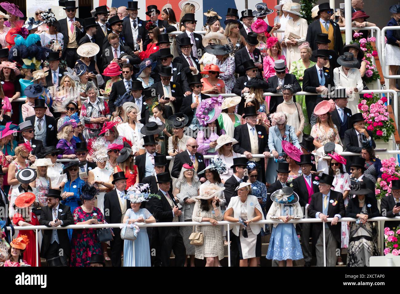 Racegoers in the Parade Ring waiting fo for the Royal Procession on day ...