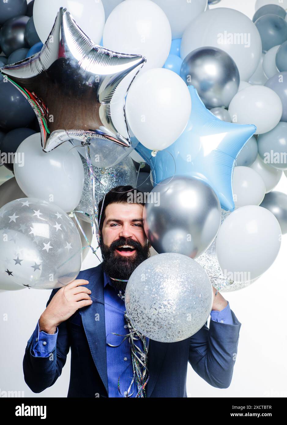 Helium balloons man hi-res stock photography and images - Alamy