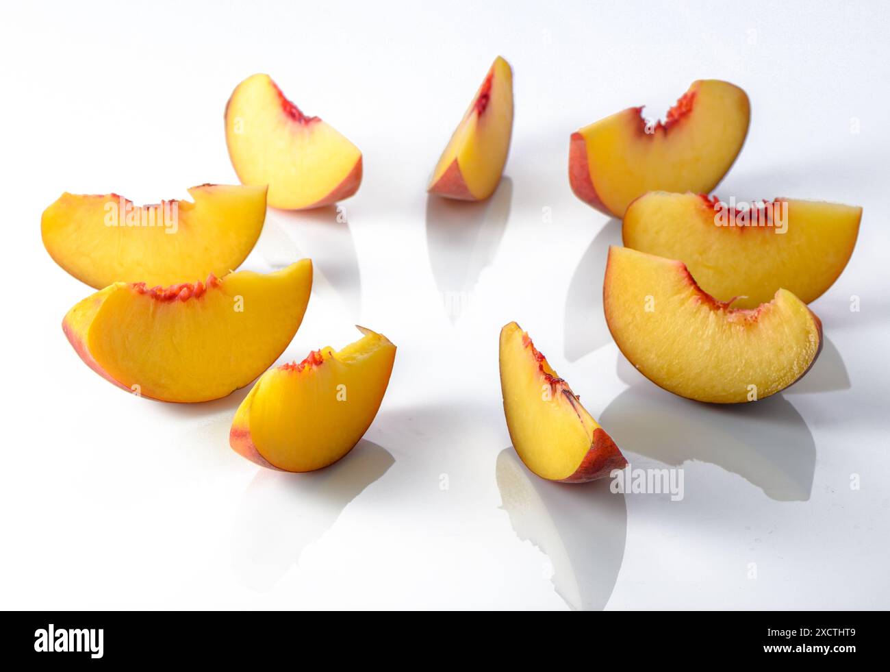ripe nectarine with leaves isolated on white background. Top view. Flat ...