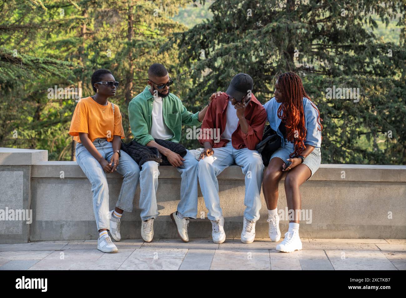 Sympathetic sad friends teens gently attentively support suffering ...