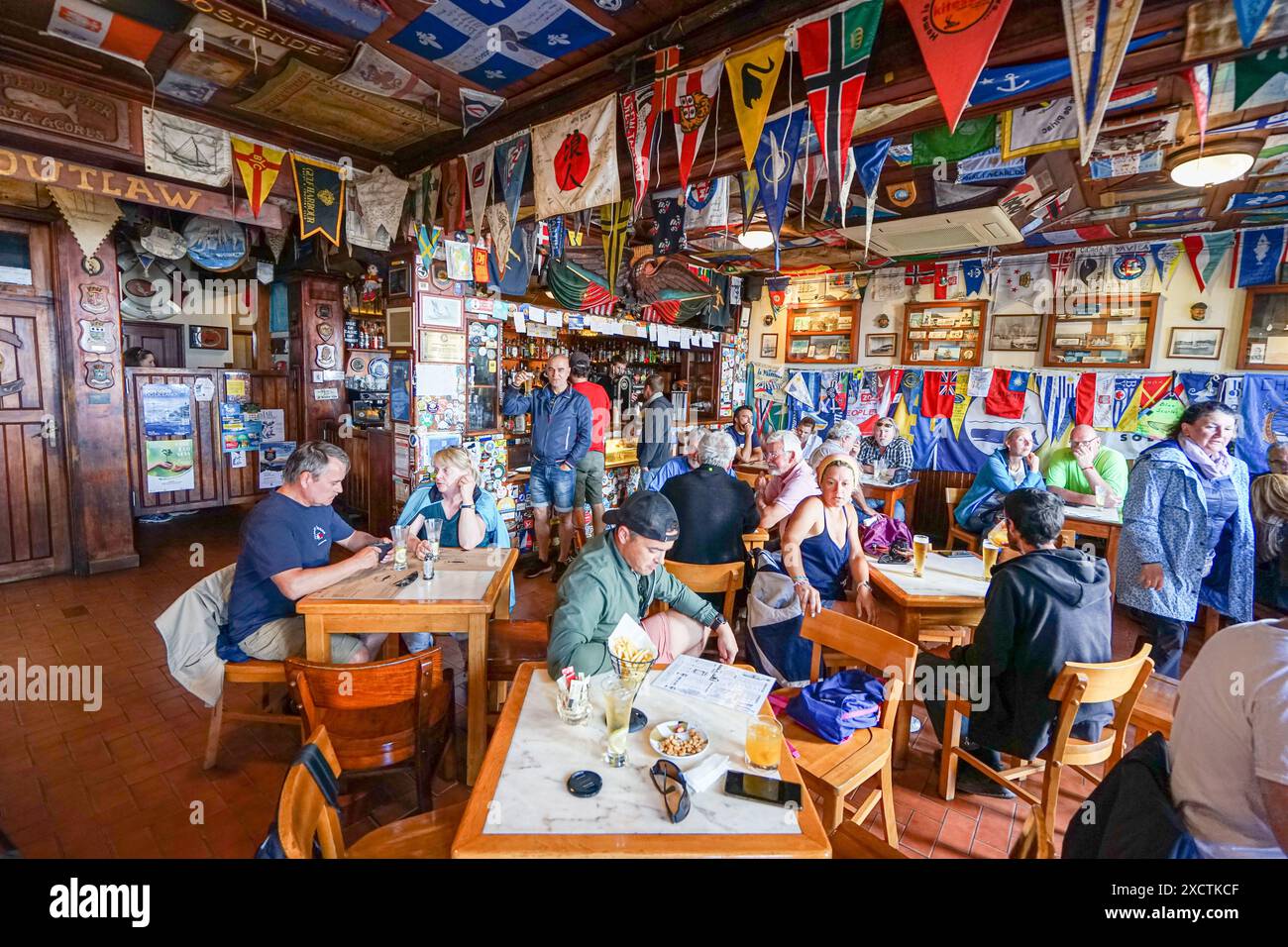 Group of people inside the famous Peters bar in Faial-Açores-Portugal ...