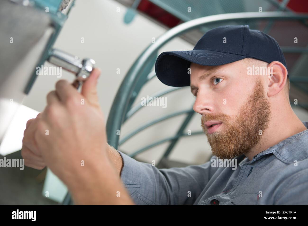 Using a wrench home hi-res stock photography and images - Alamy