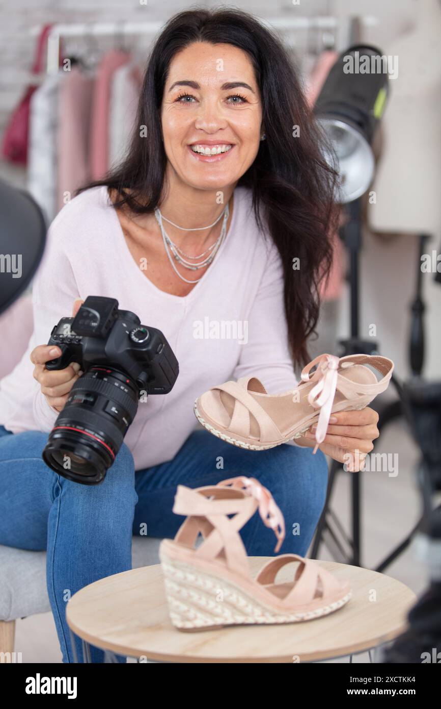 product photography concept - beautiful senior photographer Stock Photo ...