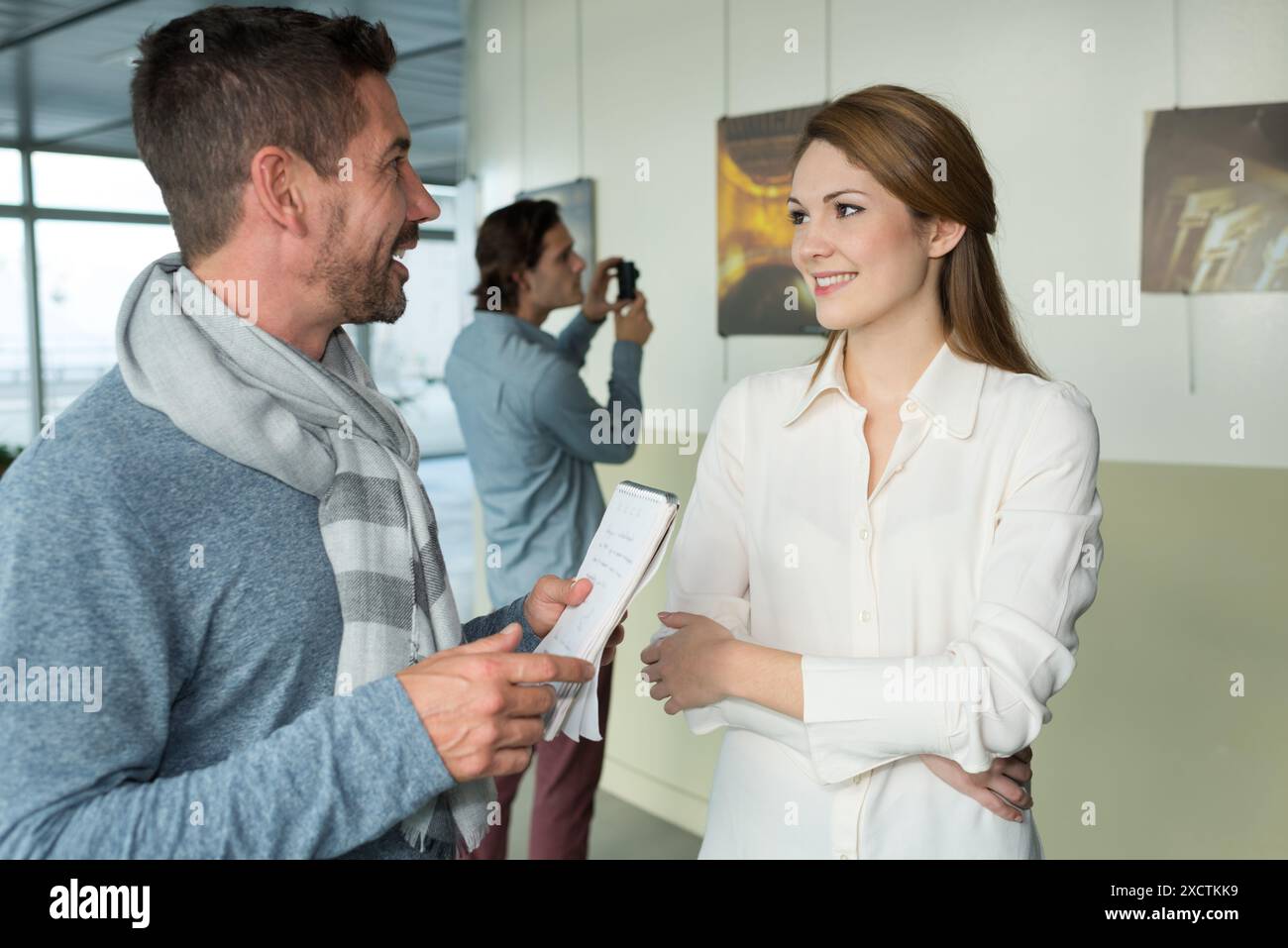Person checking painting hi-res stock photography and images - Alamy