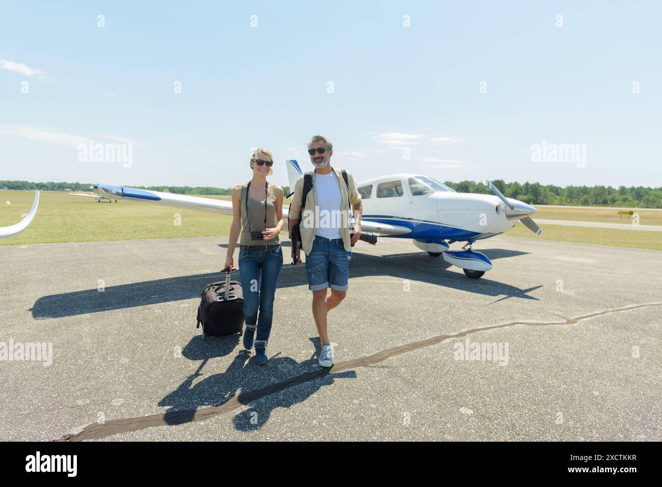 Private jet couple hi-res stock photography and images - Alamy