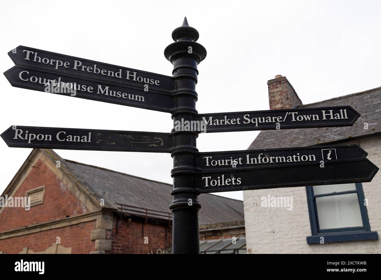 Signposts pointing to attractions in the North Yorkshire of Ripon ...