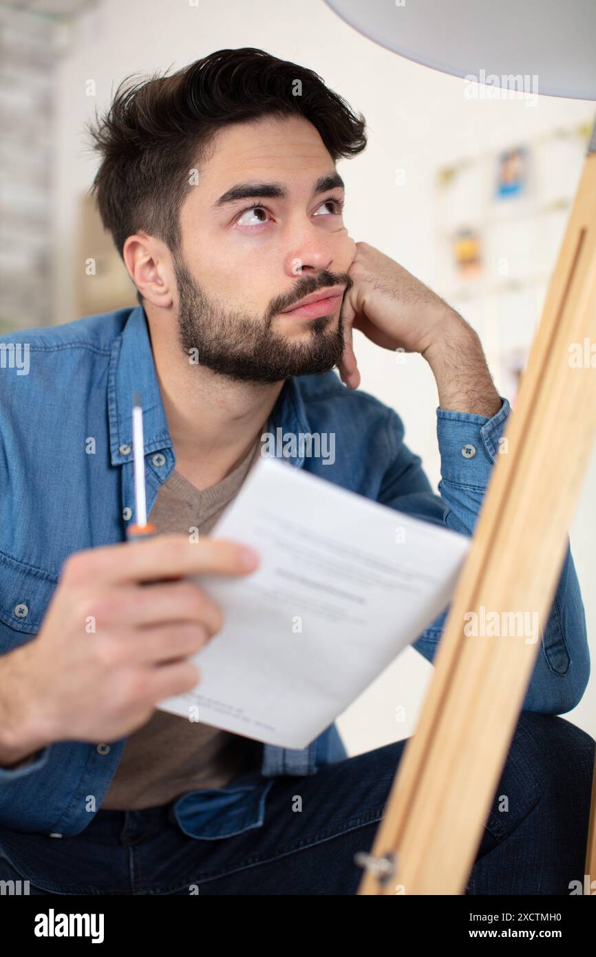 man stucking with assembling furniture Stock Photo - Alamy