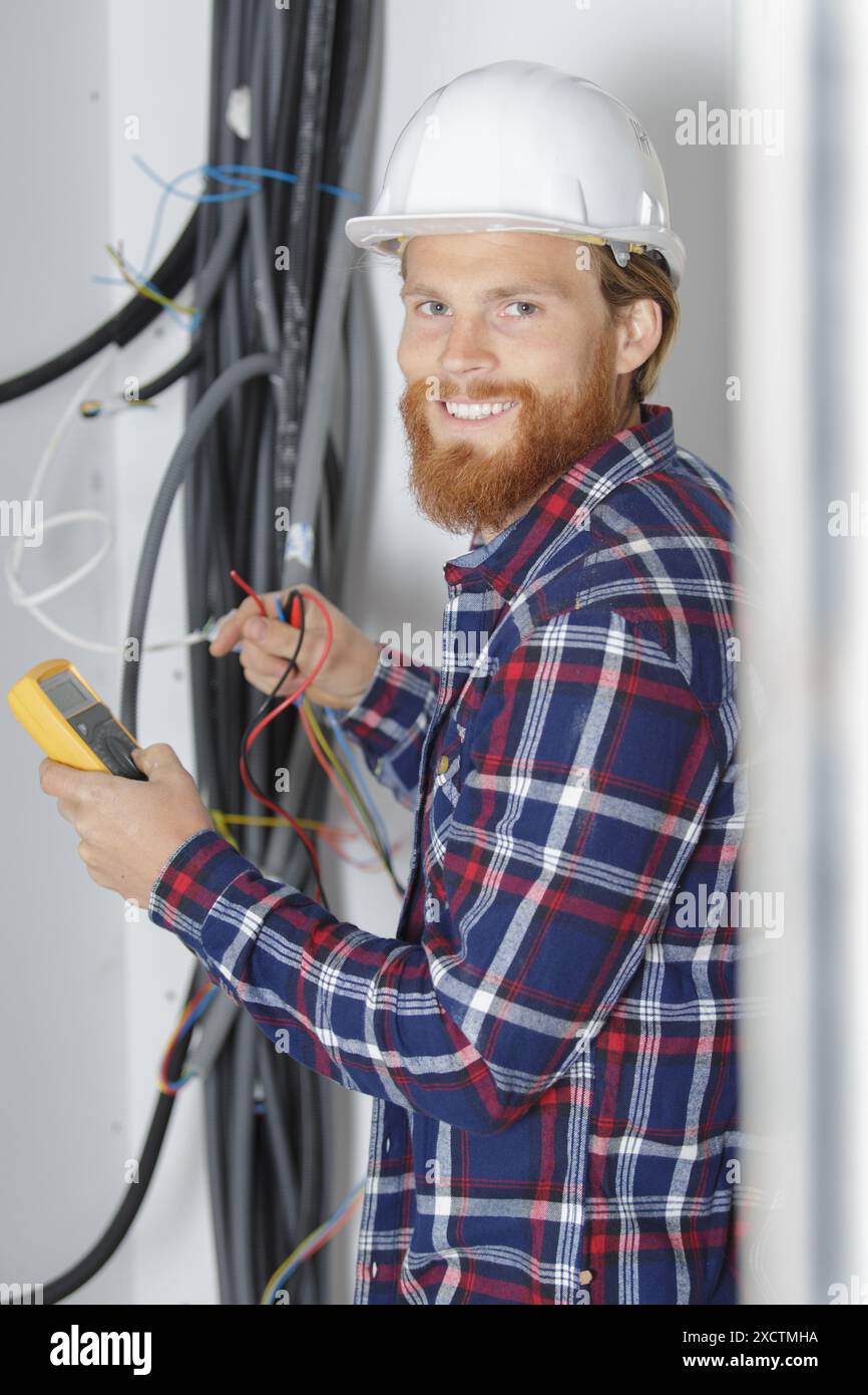 Electrician using multimeter hi-res stock photography and images - Alamy
