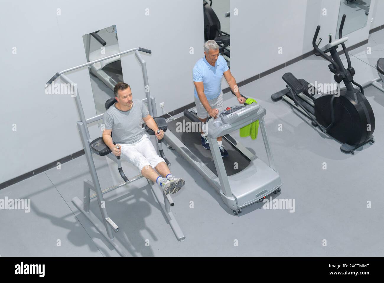two men having intense workout in the gym Stock Photo - Alamy