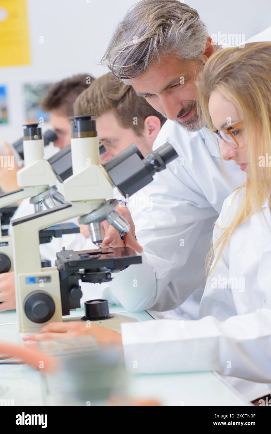 student and teacher in observation Stock Photo - Alamy