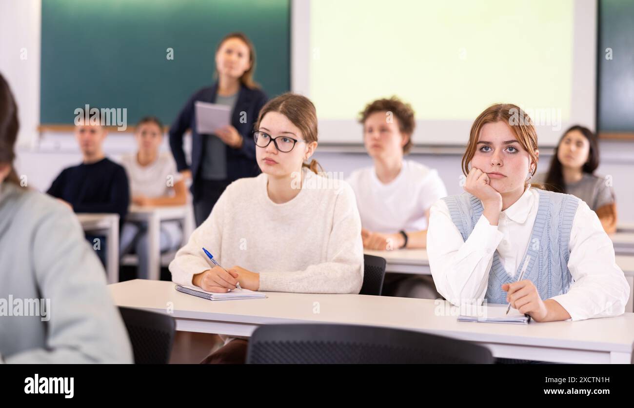 Young girls students study diligently at school Stock Photo - Alamy