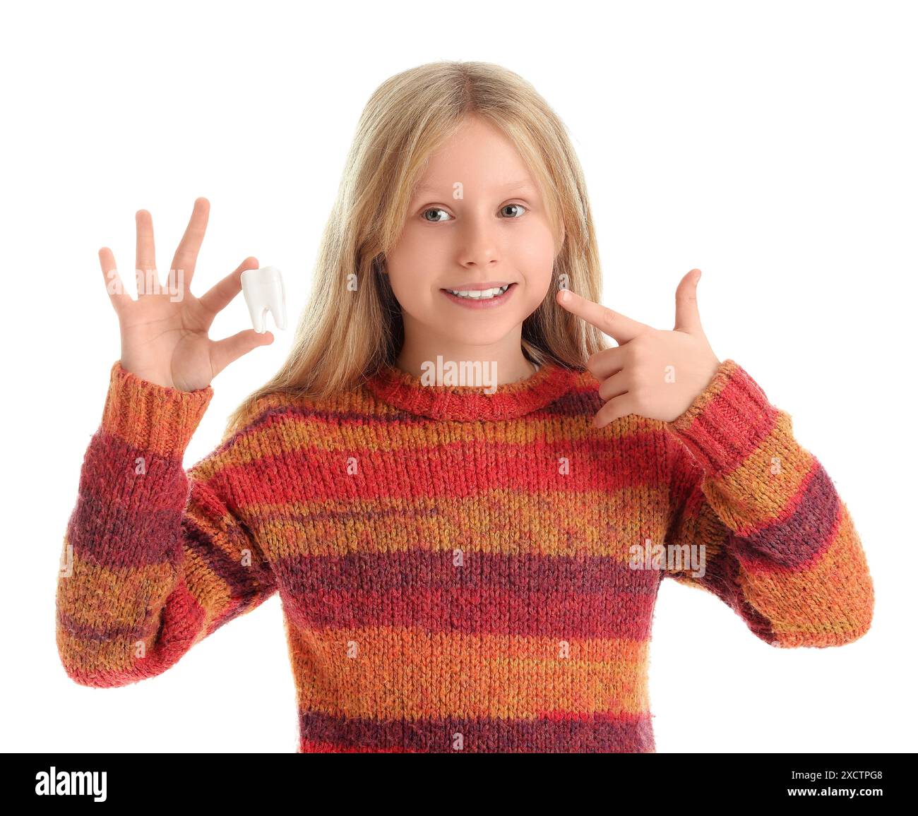 Happy little girl with healthy teeth and model of tooth isolated on ...