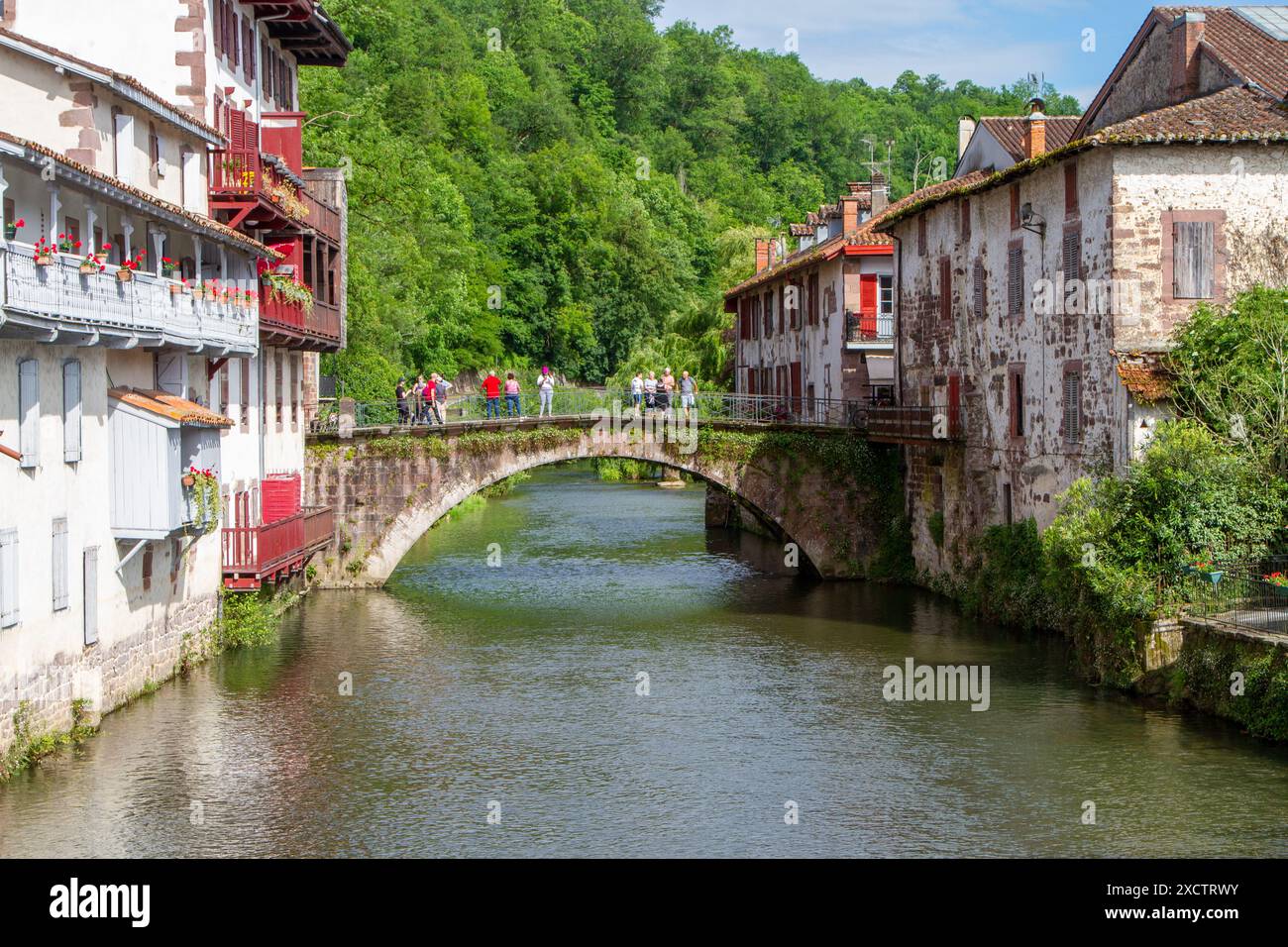 The river Nive flowing through the town of Saint-Jean-Pied-de-Port the ...