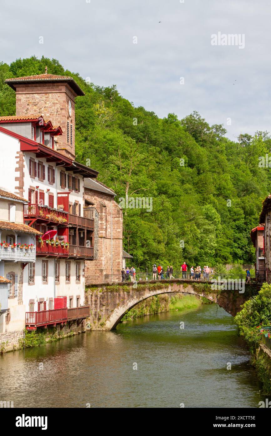 The river Nive flowing through the town of Saint-Jean-Pied-de-Port the ...