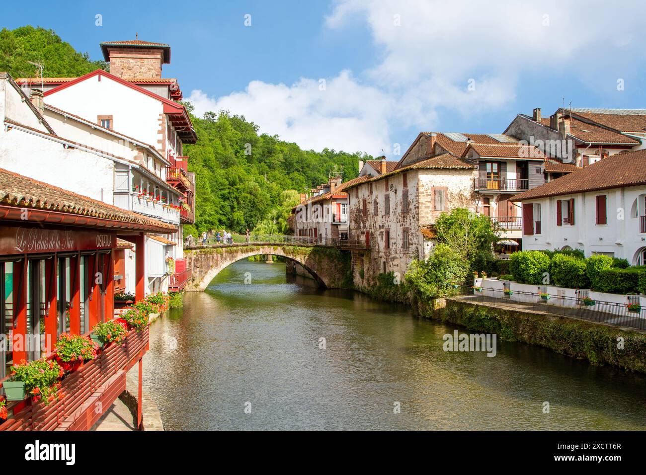 The river Nive flowing through the town of Saint-Jean-Pied-de-Port the ...