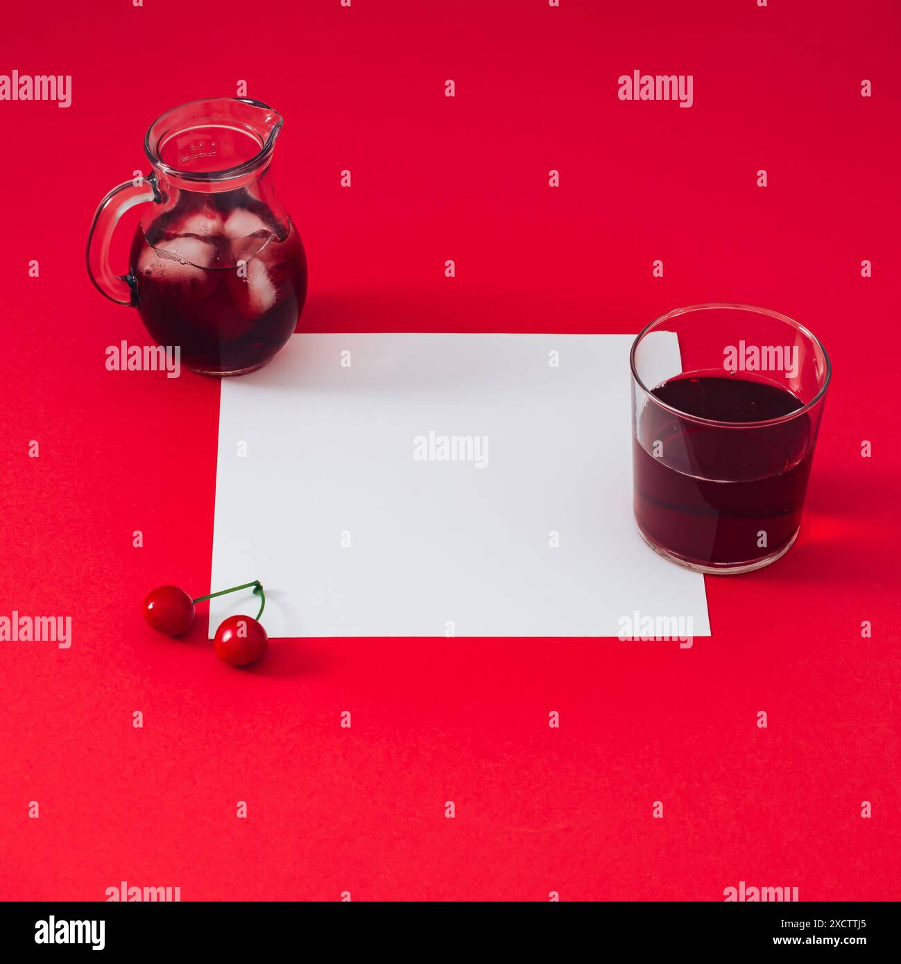 Jar and glass of cherry juice with cherries and paper card note copy ...