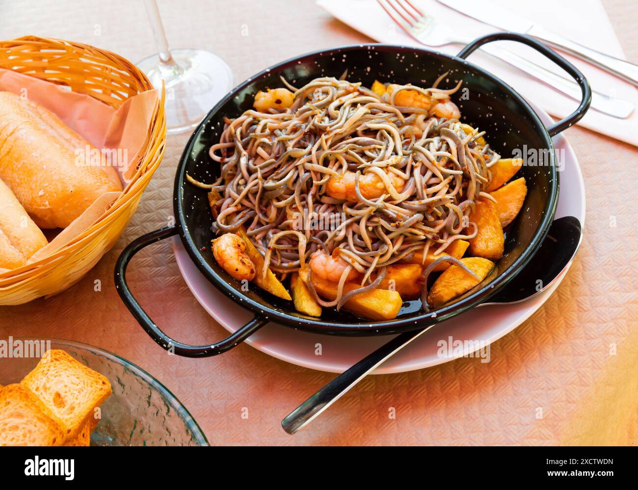 Surimi elvers with prawns and potato Stock Photo - Alamy